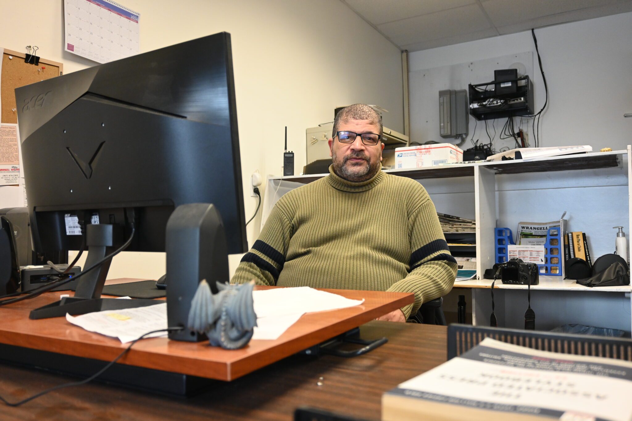 The Wrangell Sentinel's reporter and photographer, Mark Robinson, opens ...